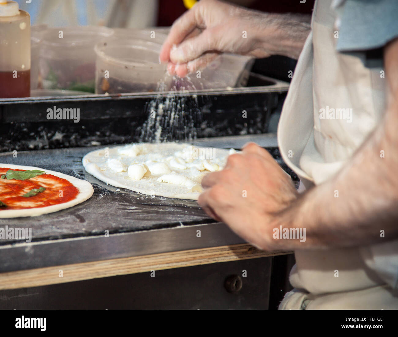 Traditional making of italian pizza Stock Photo - Alamy