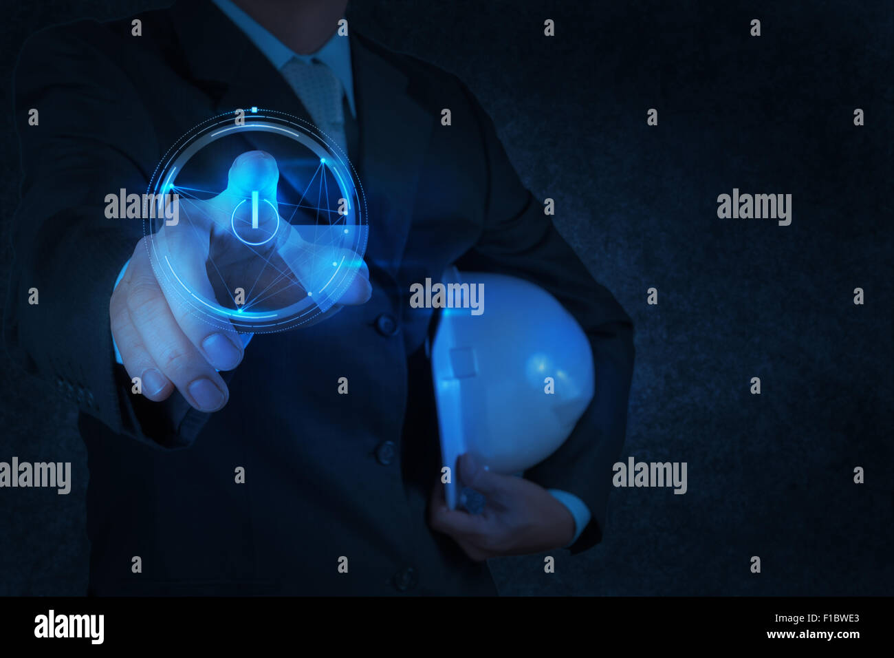 engineer pushing start button on touch screen computer interface Stock ...