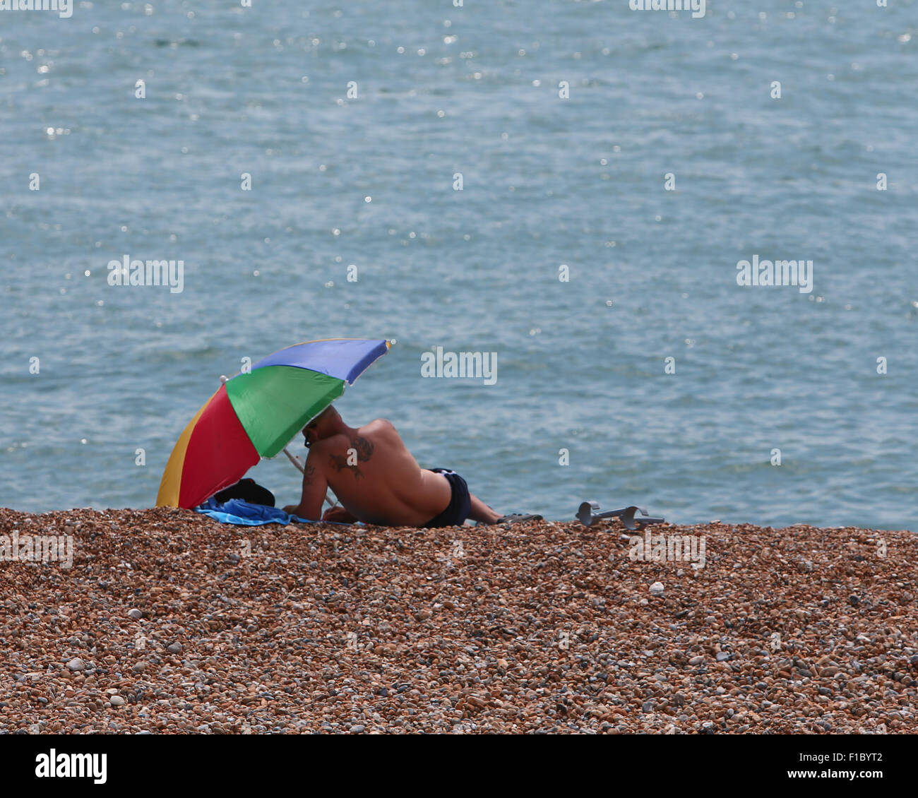 Sun worshippers enjoy the hot weather on what is said to be the hottest ...