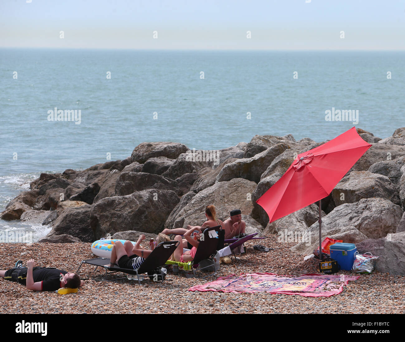 Sun worshippers enjoy the hot weather on what is said to be the hottest ...