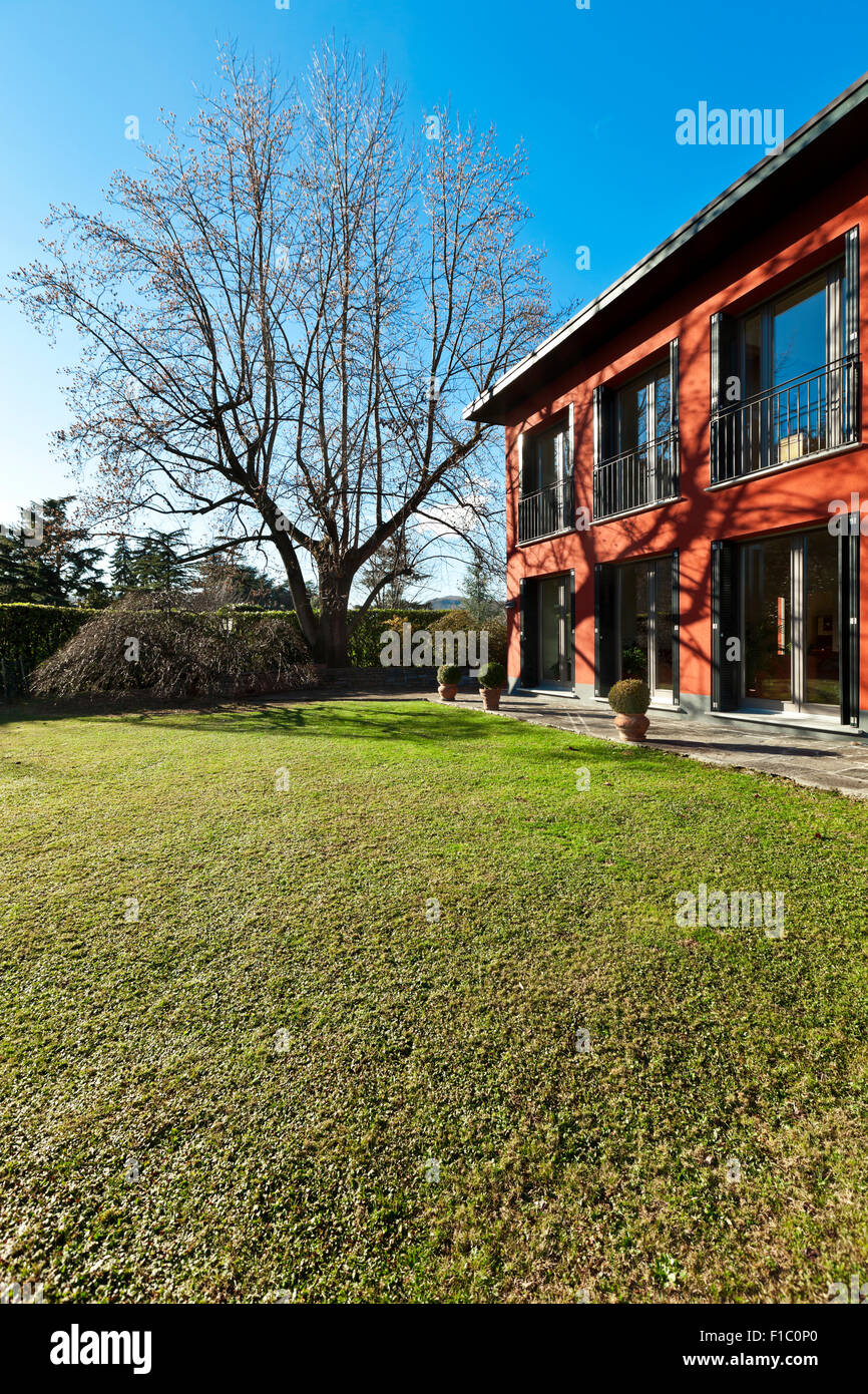 beautiful apartment, outdoor, red facade Stock Photo - Alamy
