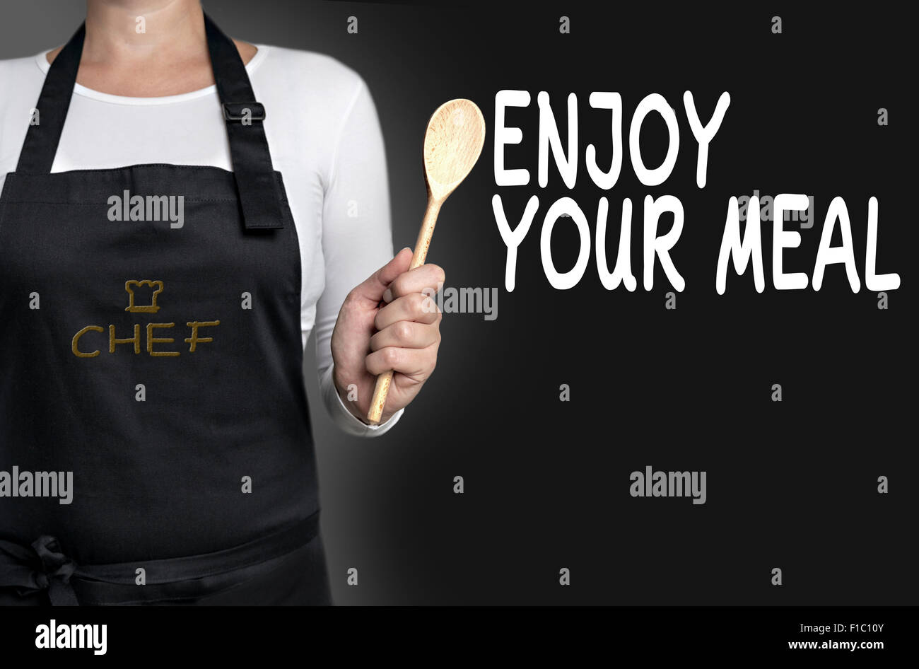 Enjoy your meal cook cooking spoon holds background Stock Photo - Alamy