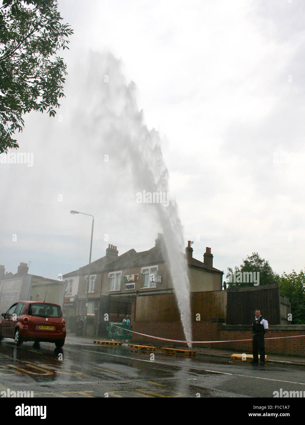 A burst water main sends water 5 stories high in Mitcham Lane, Tooting ...