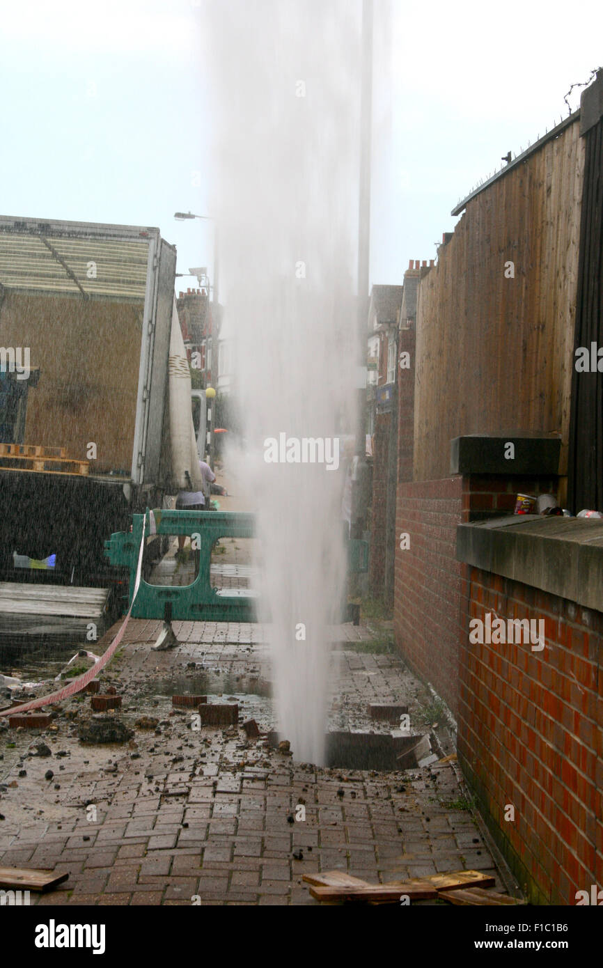 A burst water main sends water 5 stories high in Mitcham Lane, Tooting ...