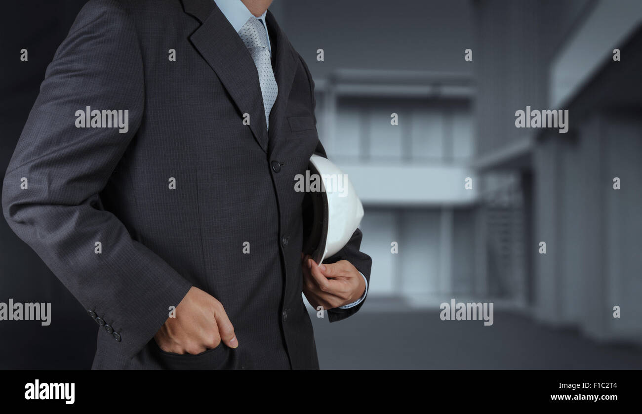 Business Architect and his modern house background Stock Photo - Alamy
