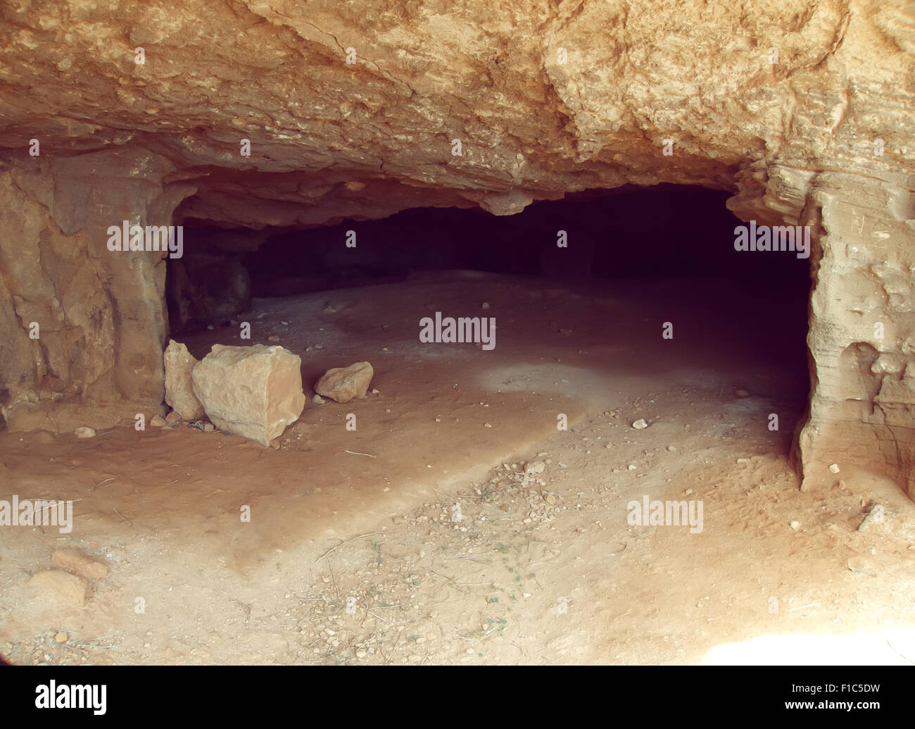 Underground cave entrance and tunnel with sunbeam end shadows Stock ...