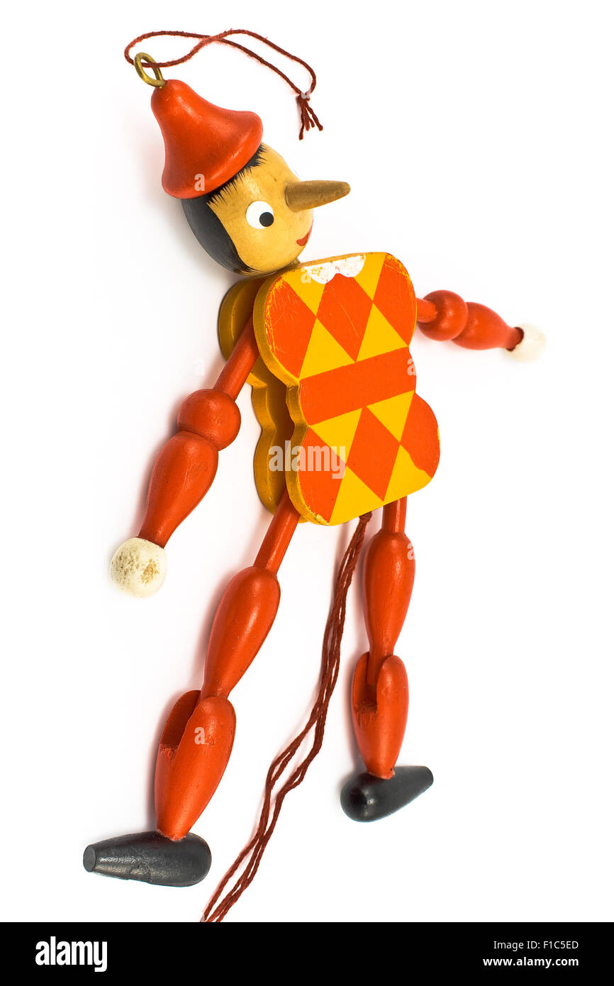 Lying mechanical toy isolated on white Stock Photo - Alamy