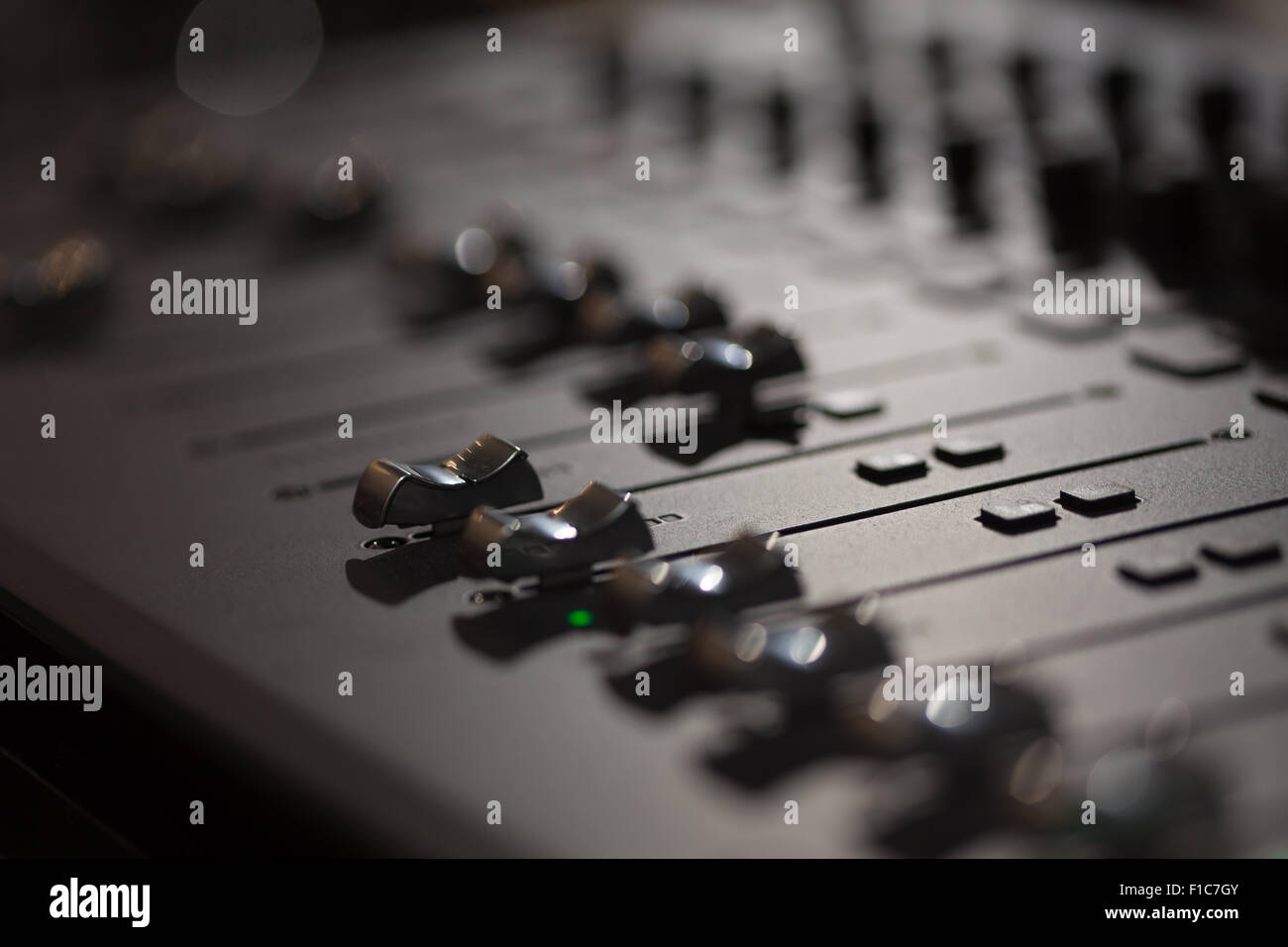 Gray audio mixing console sliders Stock Photo - Alamy