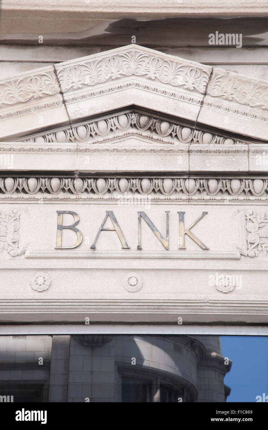 Bank Sign on White Building Facade Stock Photo - Alamy