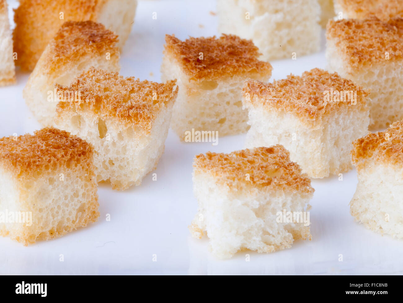 Fried brow pieaces of bread Stock Photo - Alamy