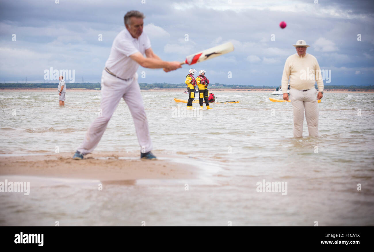 Action gets underway at the annual Bramble Bank cricket match in the ...