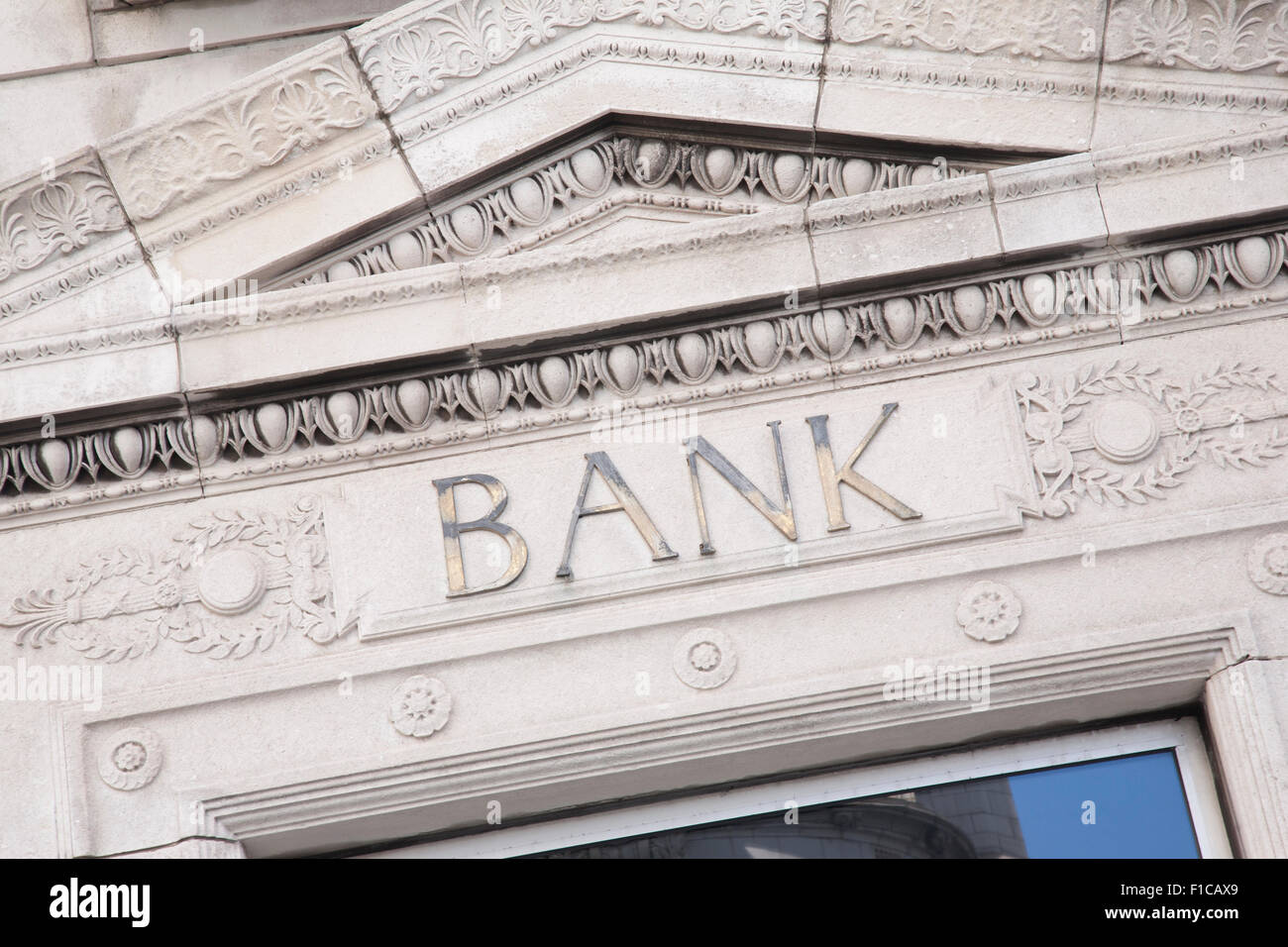 Bank Sign on White Building Facade Stock Photo - Alamy