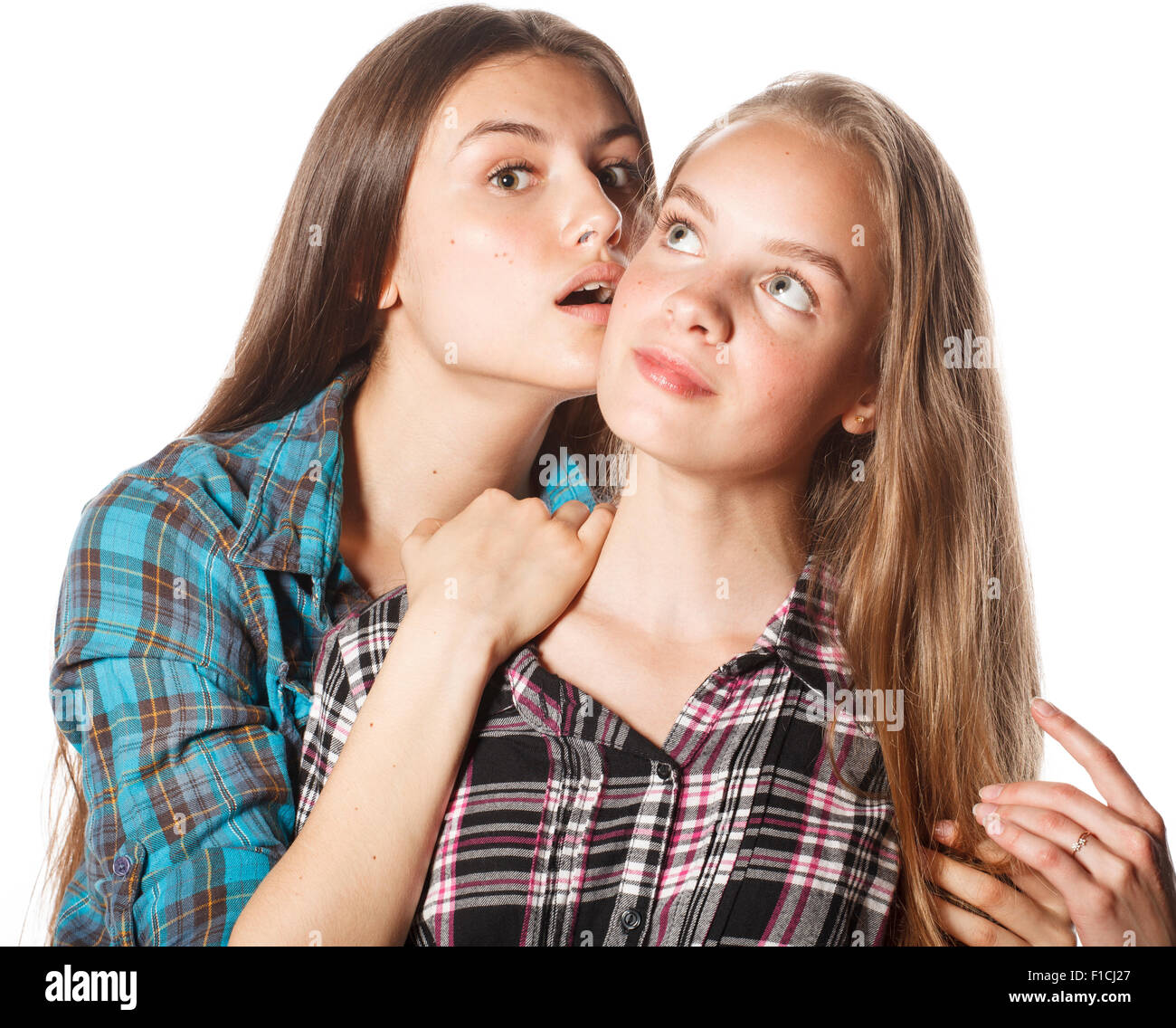 two cute teenagers having fun together isolated on white Stock Photo ...