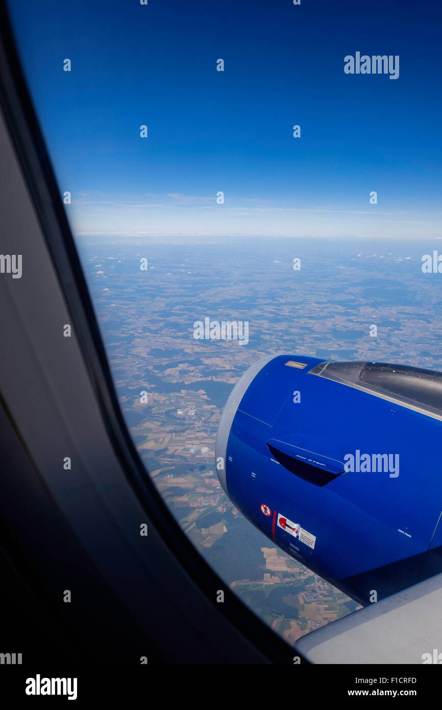Aerial view over Germany from BA Airbus 320 window showing engine and ...