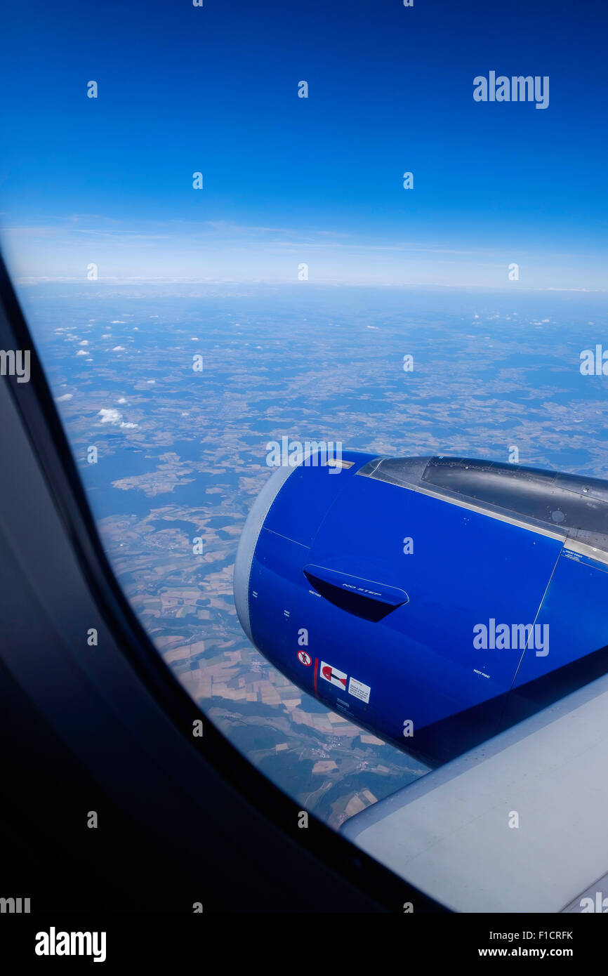 Aerial view over Germany from BA Airbus 320 window showing engine and ...