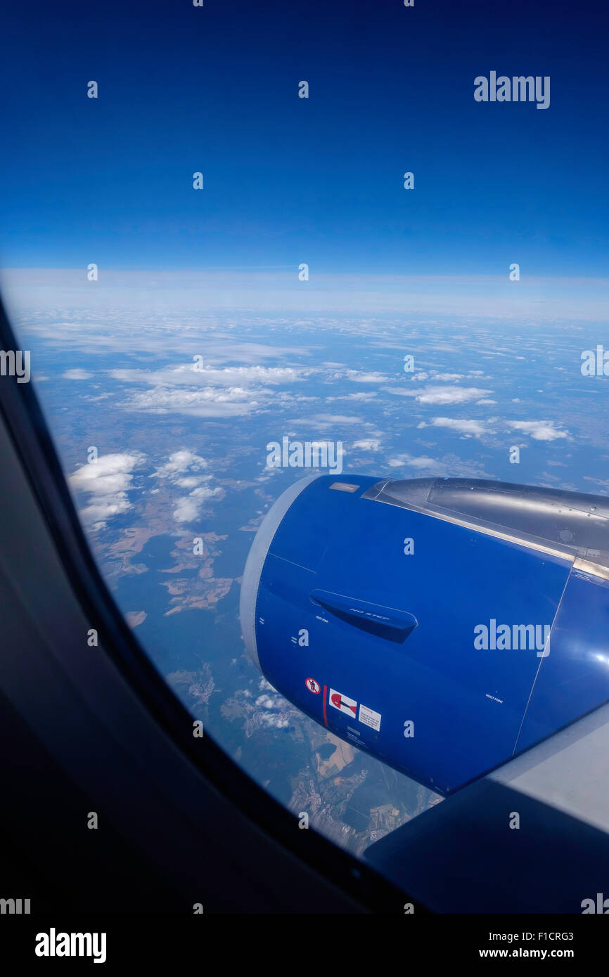 Aerial view over Germany from BA Airbus 320 window showing engine and ...