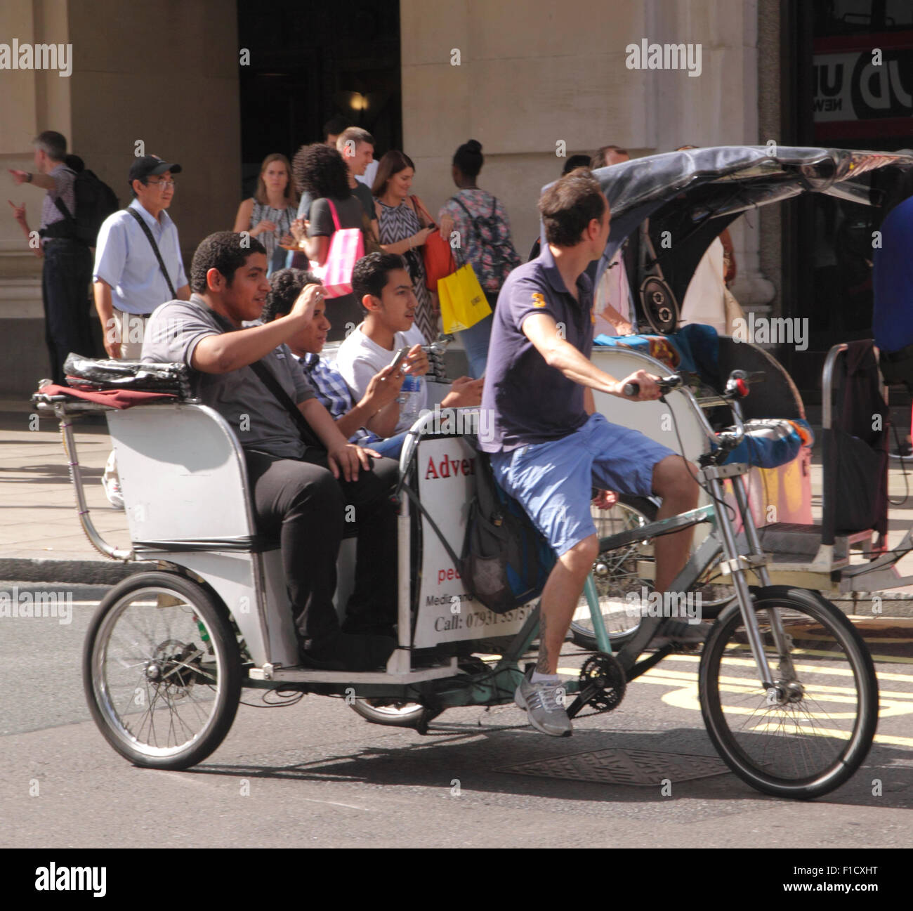 Pedicab rickshaw hi-res stock photography and images - Alamy