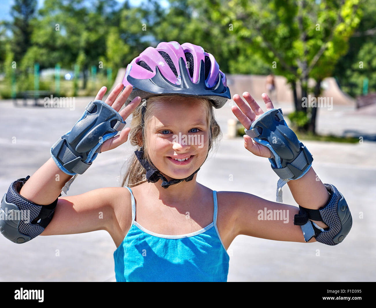 Girl riding on roller skates Stock Photo - Alamy