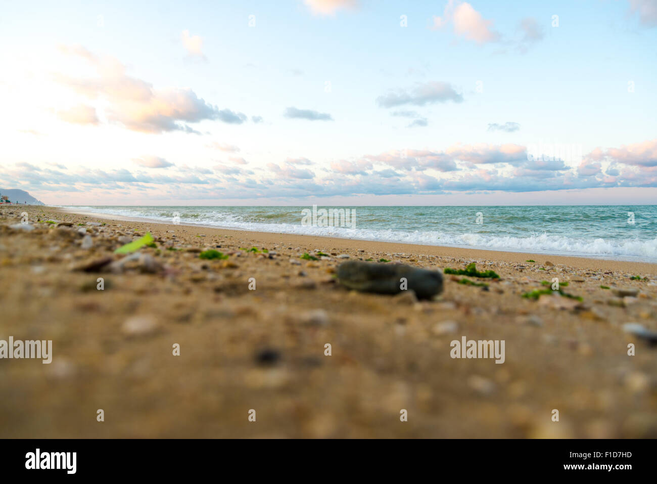 Ground perspective on a beach in Porto Recanati, Italy, at sunset Stock ...