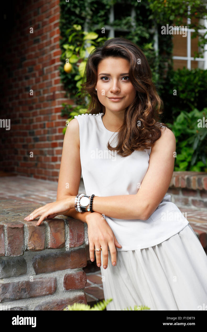 Portrait of a beautiful brunette outdoors Stock Photo - Alamy