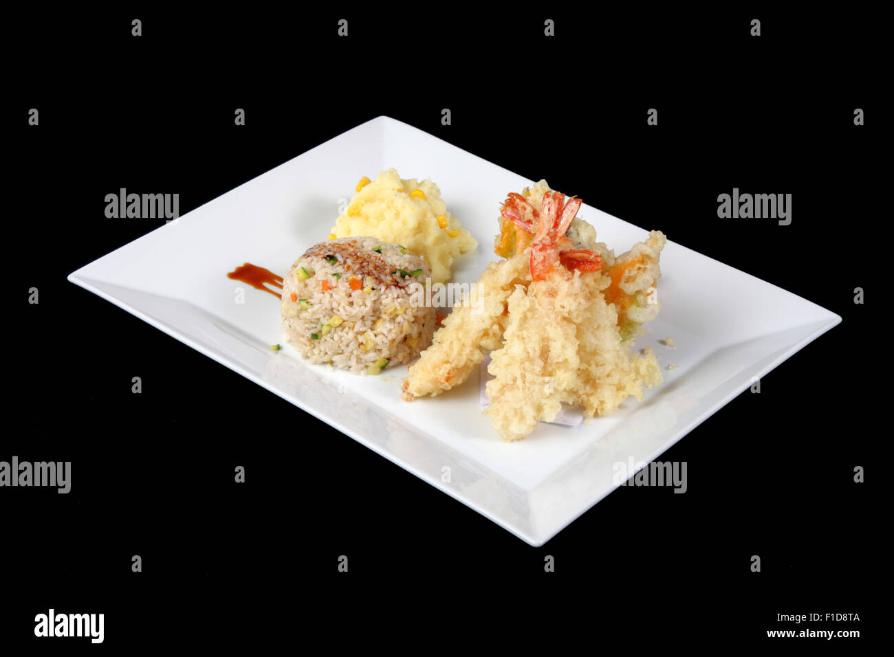 menu of fried fish with rice and mashed potatoes in white dish, on blac ...