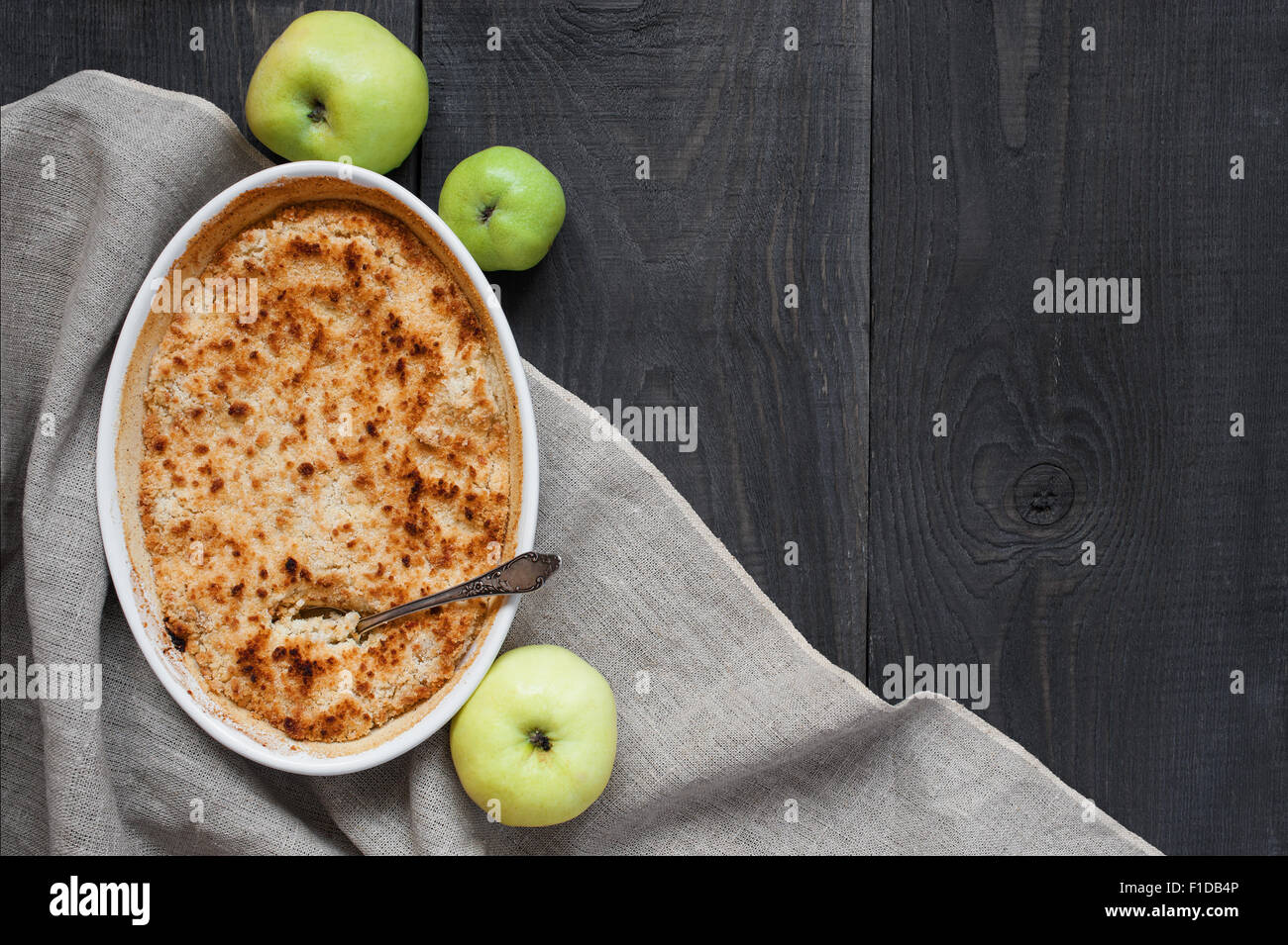 Apple crumble on the old wood background Stock Photo - Alamy