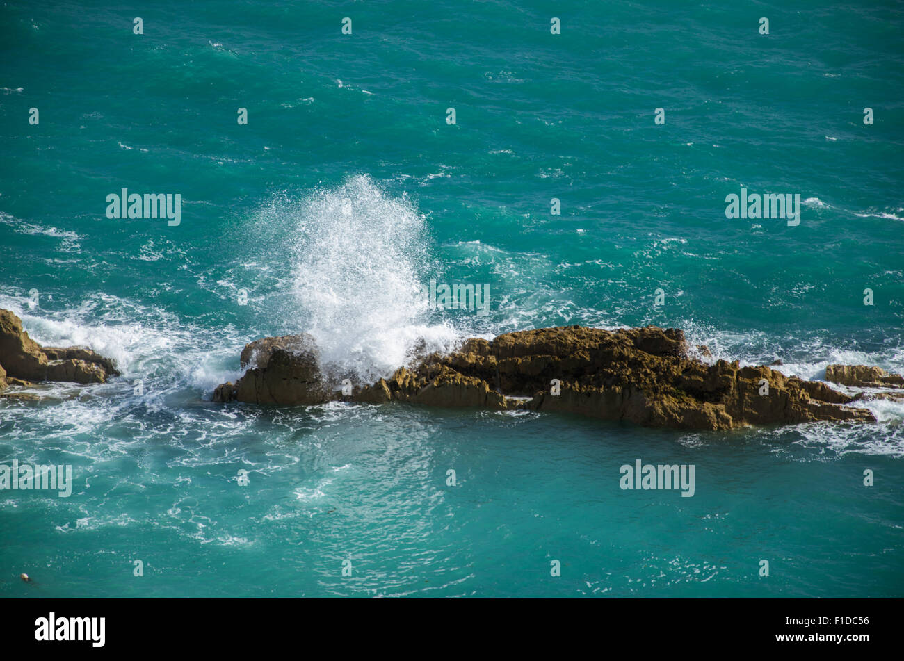 Waves hitting rock, rock, water, sea, water splash Stock Photo - Alamy
