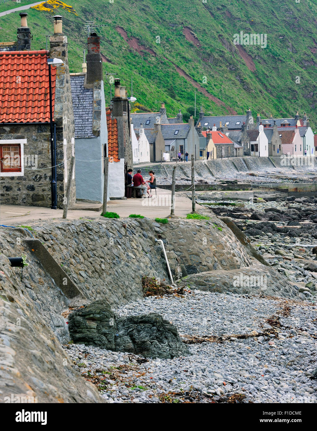Crovie, a small village on a narrow ledge along the sea comprising a ...