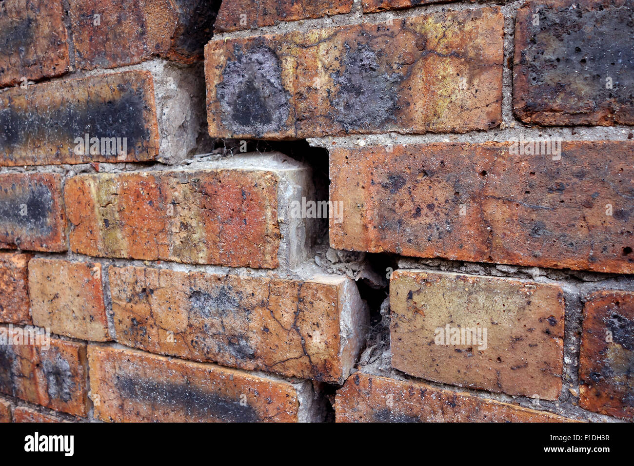 Old brick wall subsidence crack cracks subsiding walls Stock Photo - Alamy
