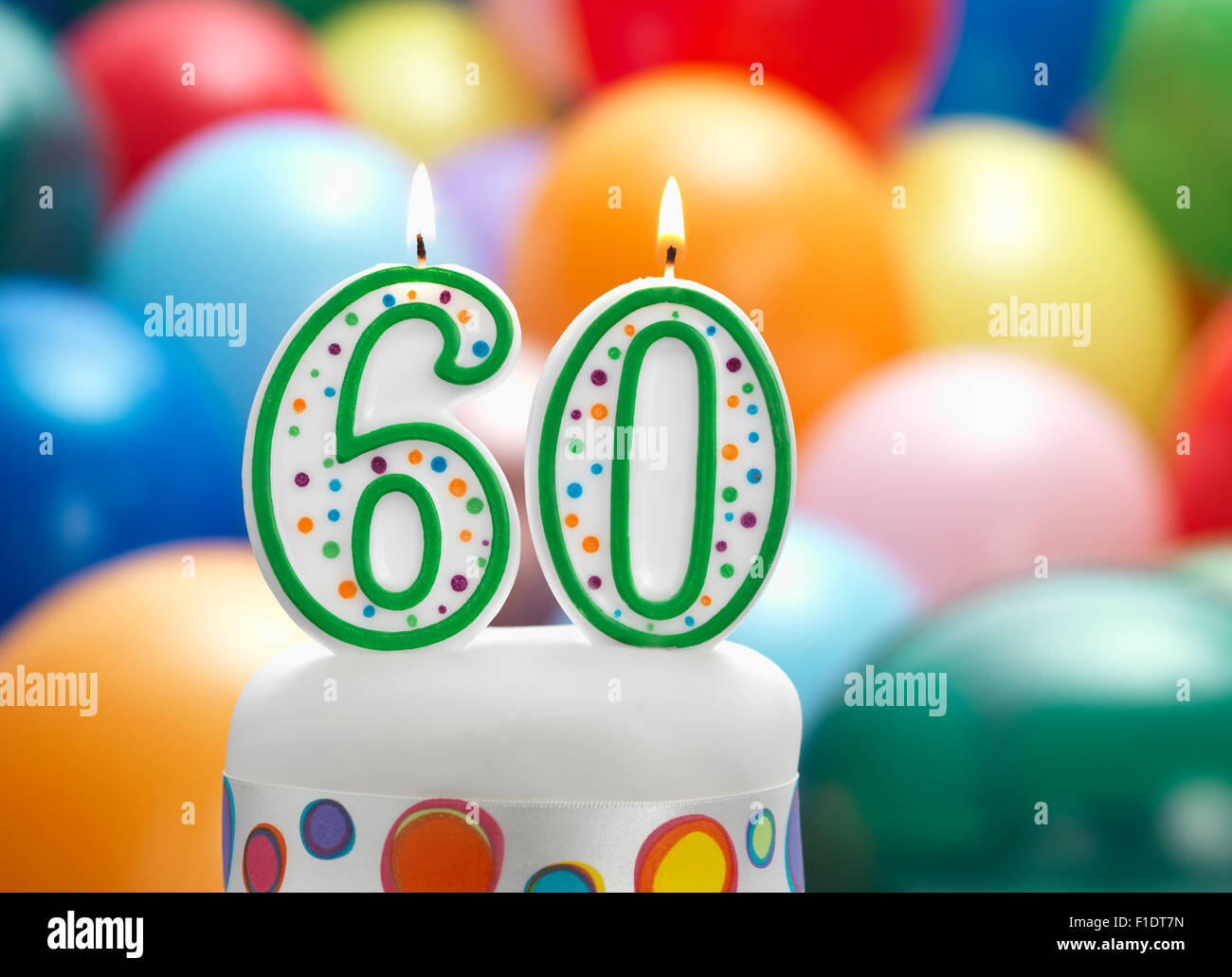 Candle with balloon party background Stock Photo - Alamy