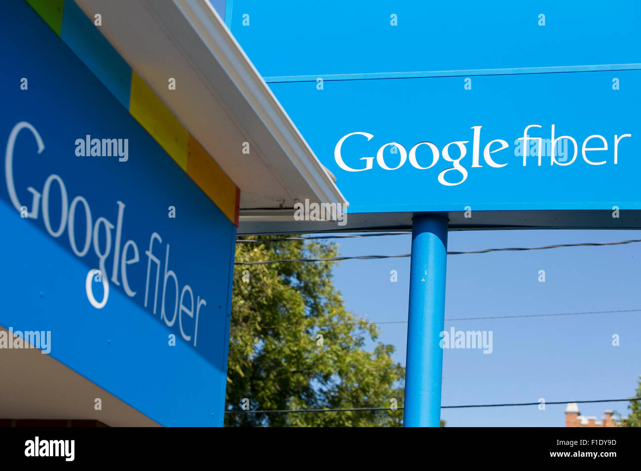 A logo sign outside of a Google Fiber sales office in Kansas City ...