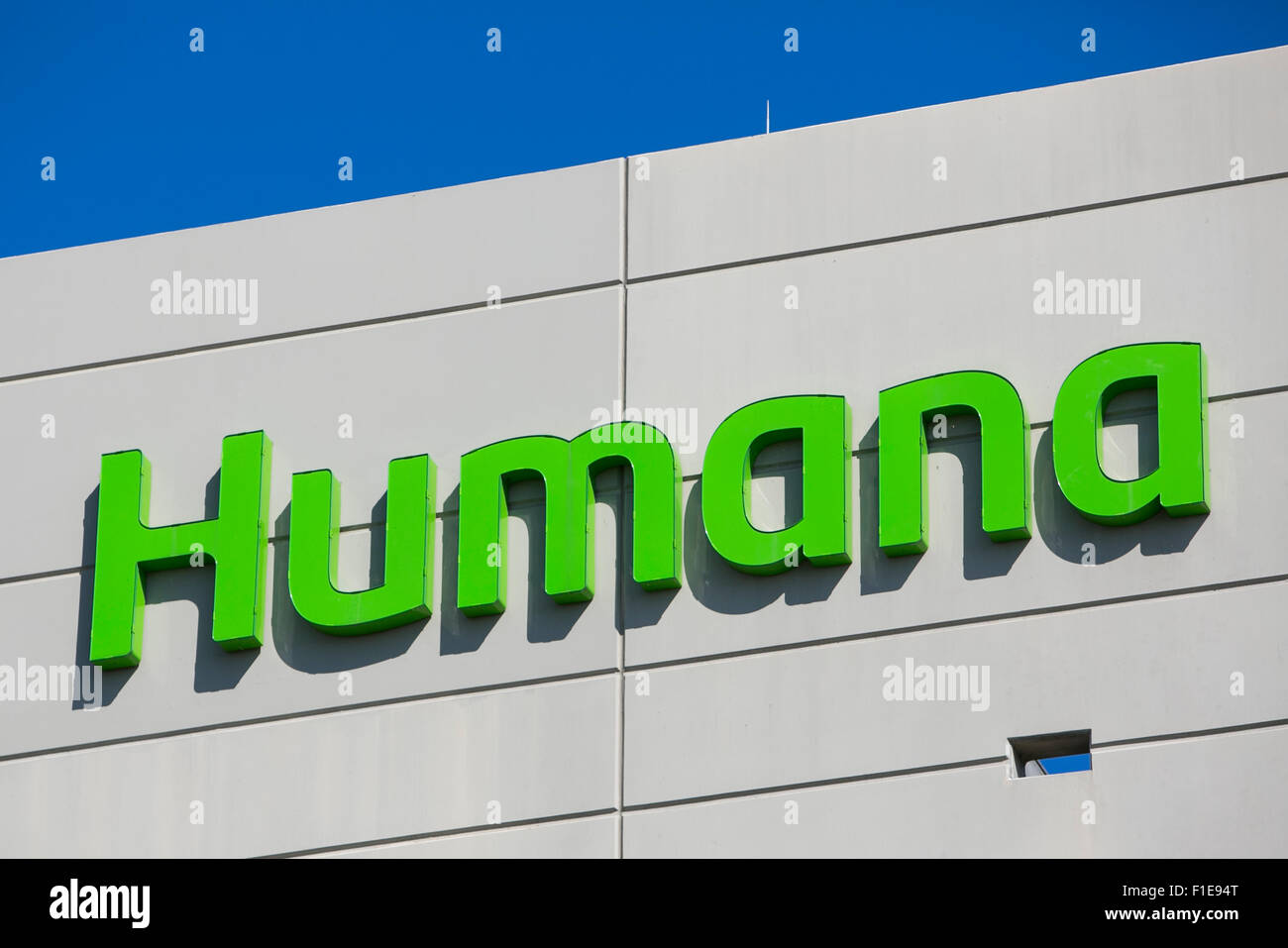 A logo sign outside of a facility occupied by Humana Inc., in ...