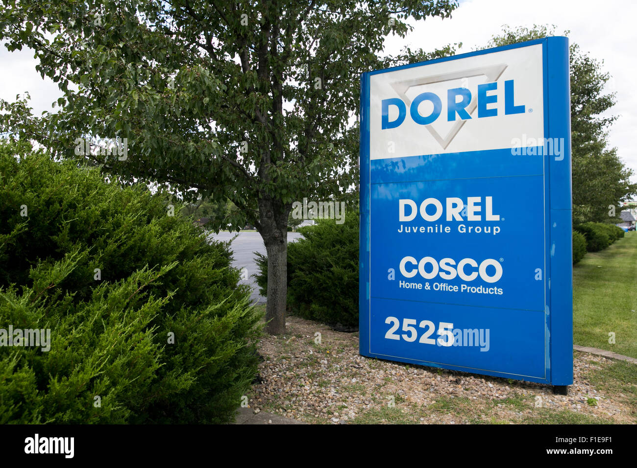 A logo sign outside of a facility occupied by Dorel Industries Inc., in ...