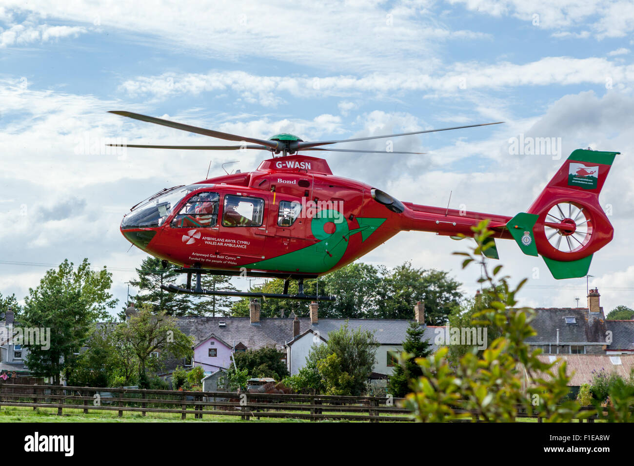 Wales Air Ambulance helicopter taking off after attending an emergency ...