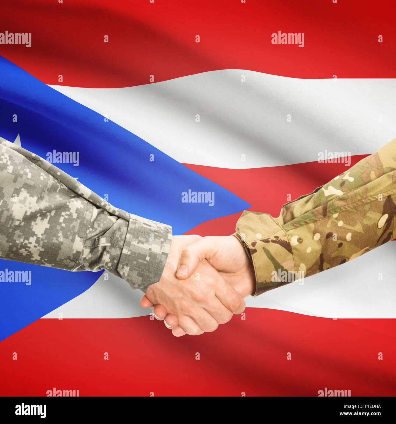 Soldiers shaking hands with flag on background - Puerto Rico Stock ...