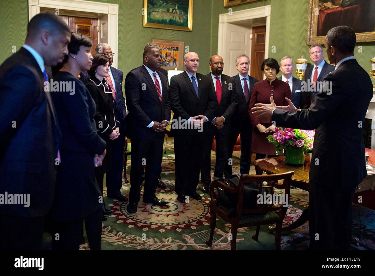 U.S. President Barack Obama talks with mayors in the Green Room prior ...