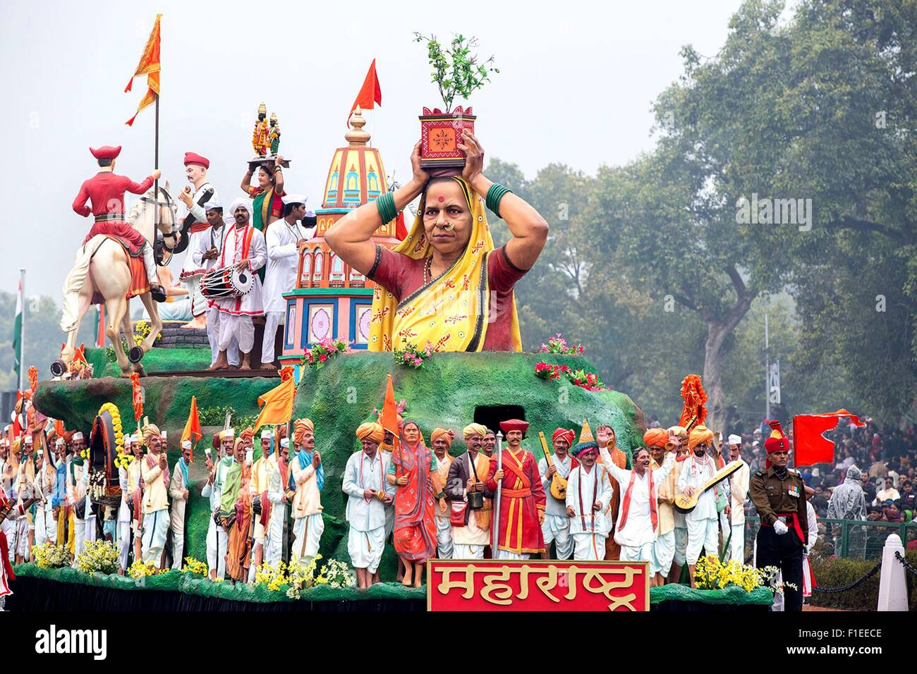 A giant float representing rural farmers passes the review stand during ...