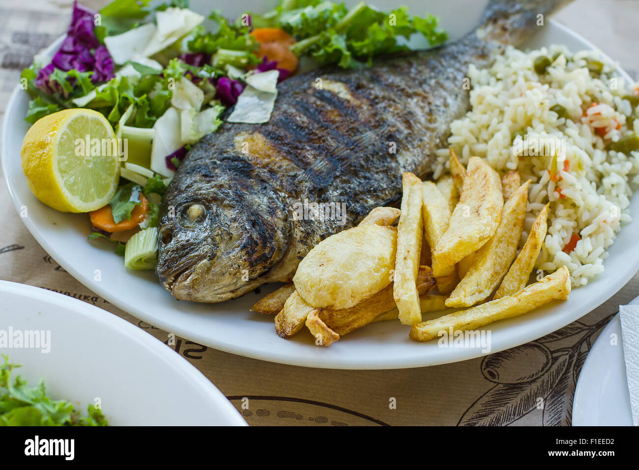 Sea bream greek salad hi-res stock photography and images - Alamy