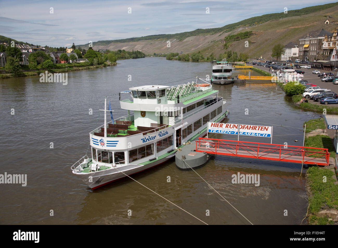 Town of Urzig with river pleasure boat moored Mosel River Germany Stock ...