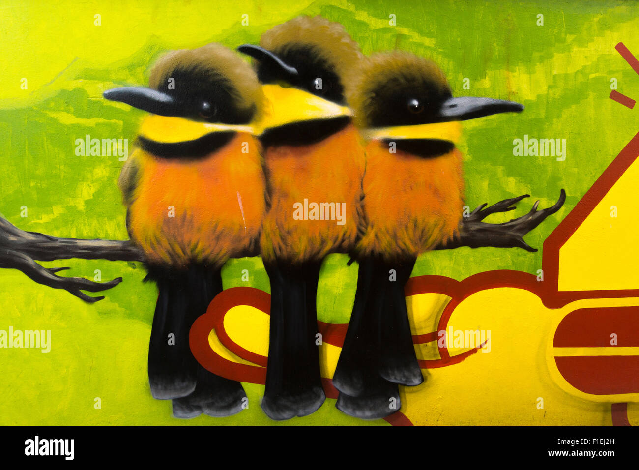 Exotic bird graffiti on the side of Piccolo Italiano Restaurant in ...