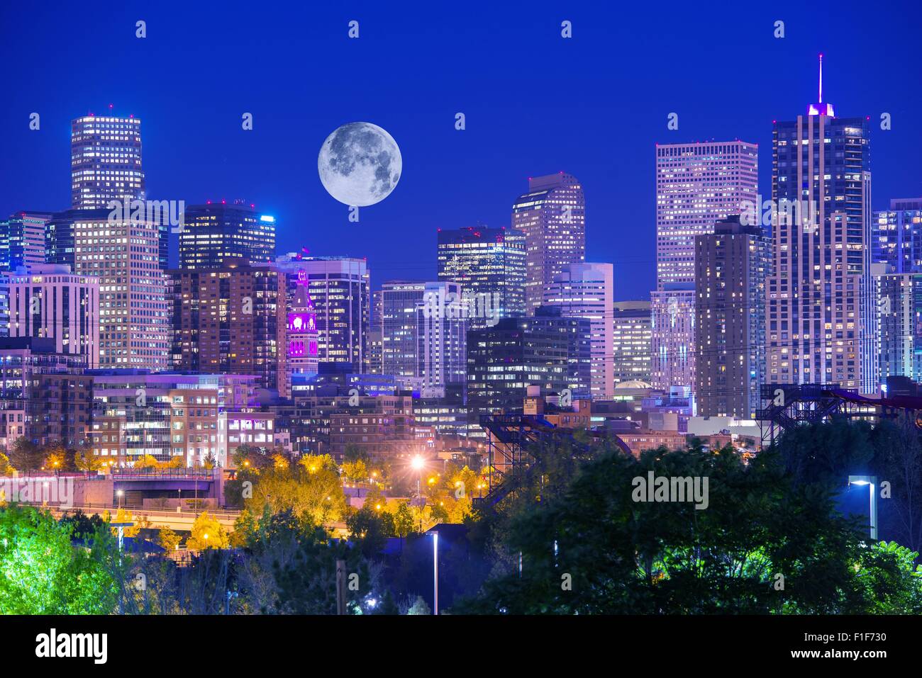 Denver Colorado at Night. Denver Downtown Skyline and the Full Moon on ...