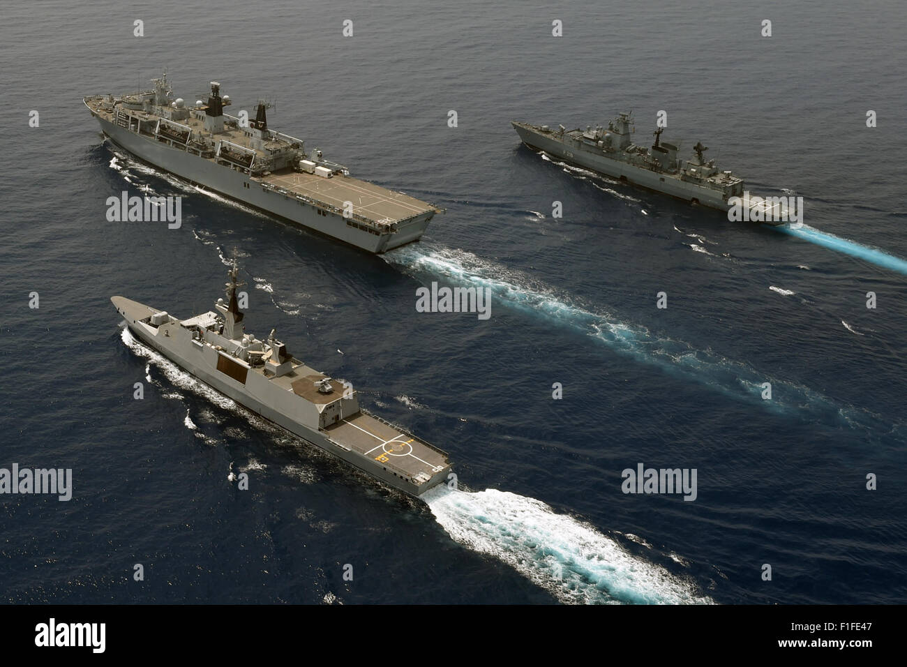 The cooperation between the Royal Navy's *HMS Bulwark*, the French ...