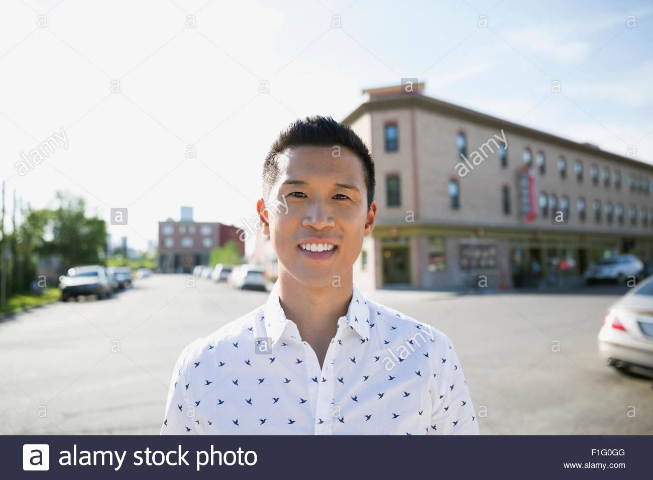 Chinese man smiling hi-res stock photography and images - Alamy