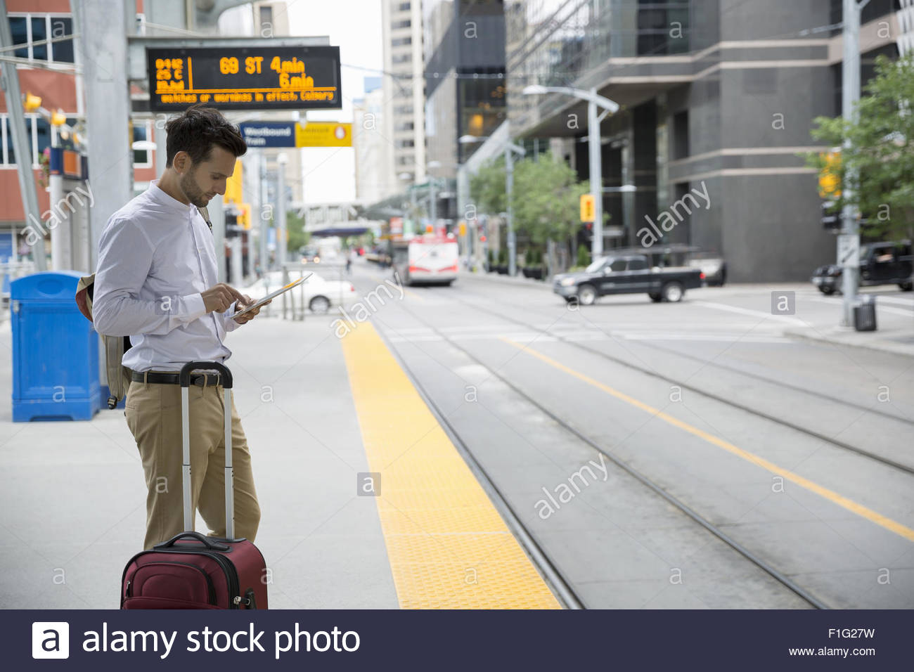 Holding standing transportation communication railroad station platform ...
