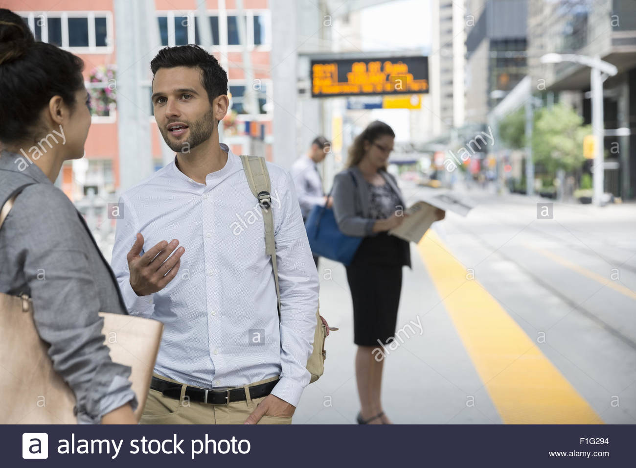 People waiting at railroad station hi-res stock photography and images ...
