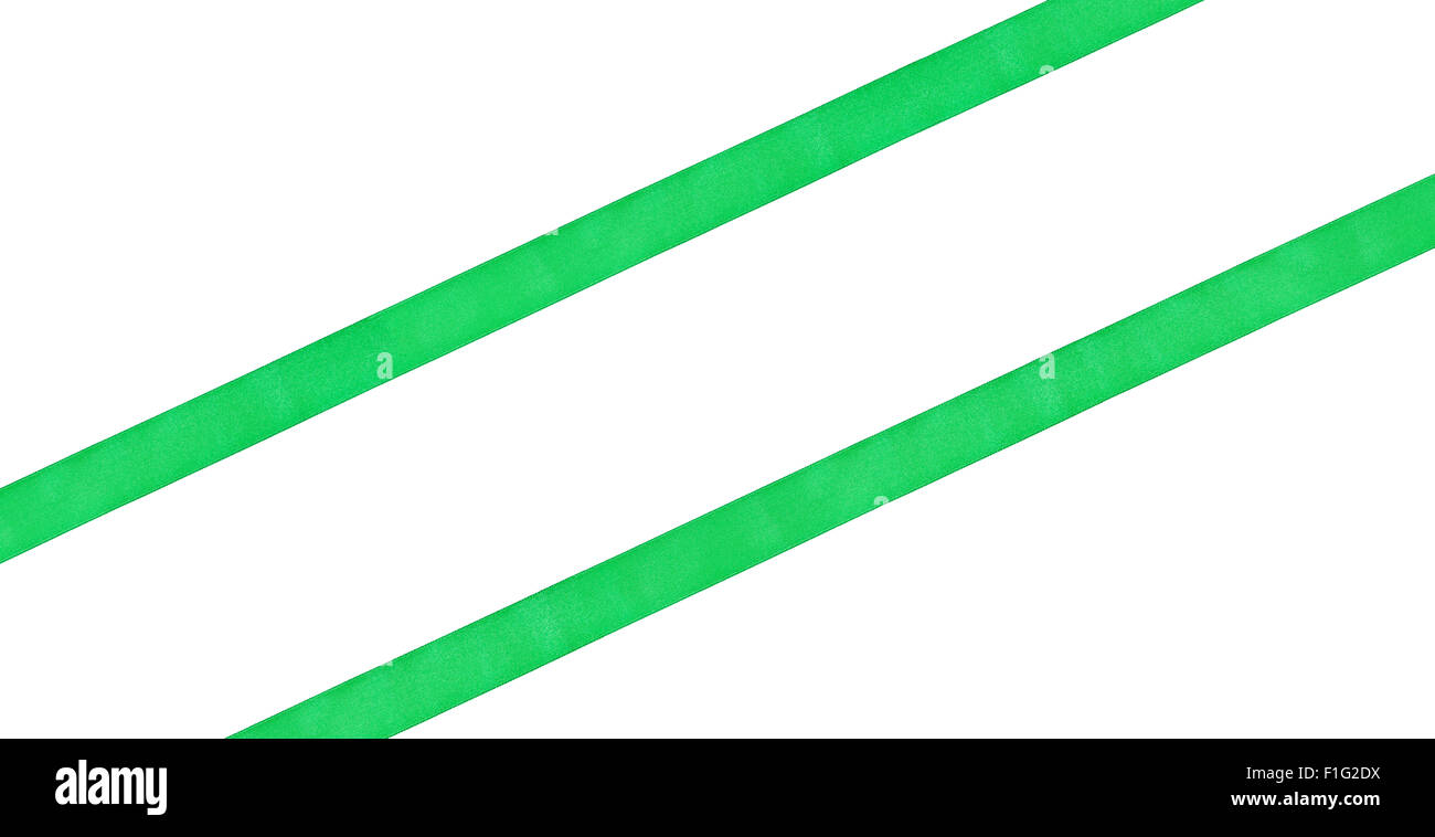 two diagonal parallel green satin ribbons isolated on white background ...