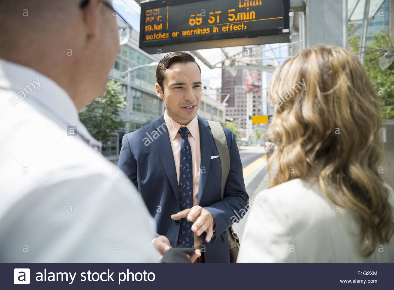 Business checking mobile train hi-res stock photography and images - Alamy