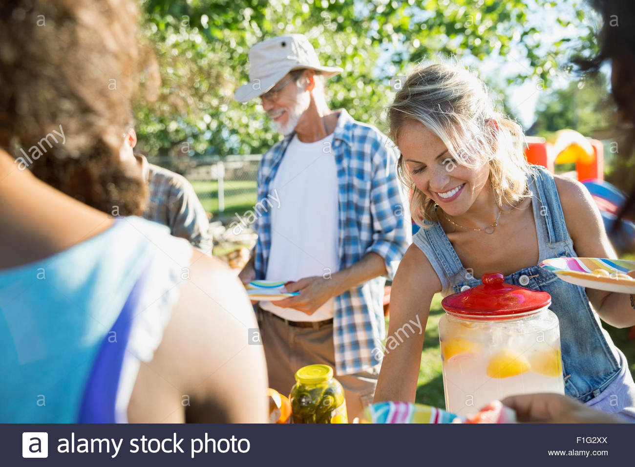 African american table reaching hi-res stock photography and images - Alamy