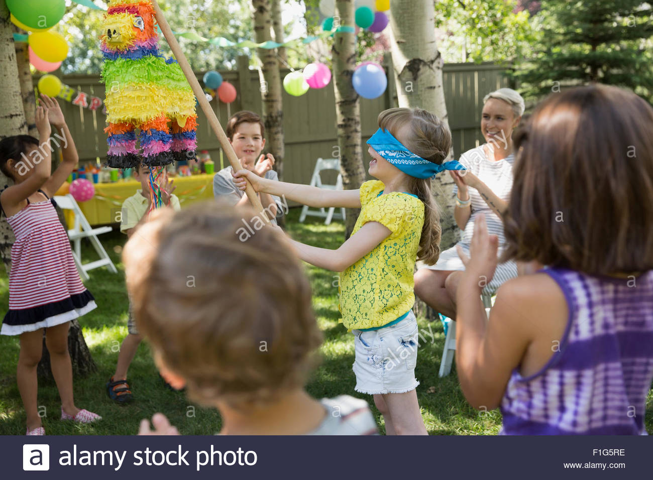 Girl pinata hi-res stock photography and images - Alamy