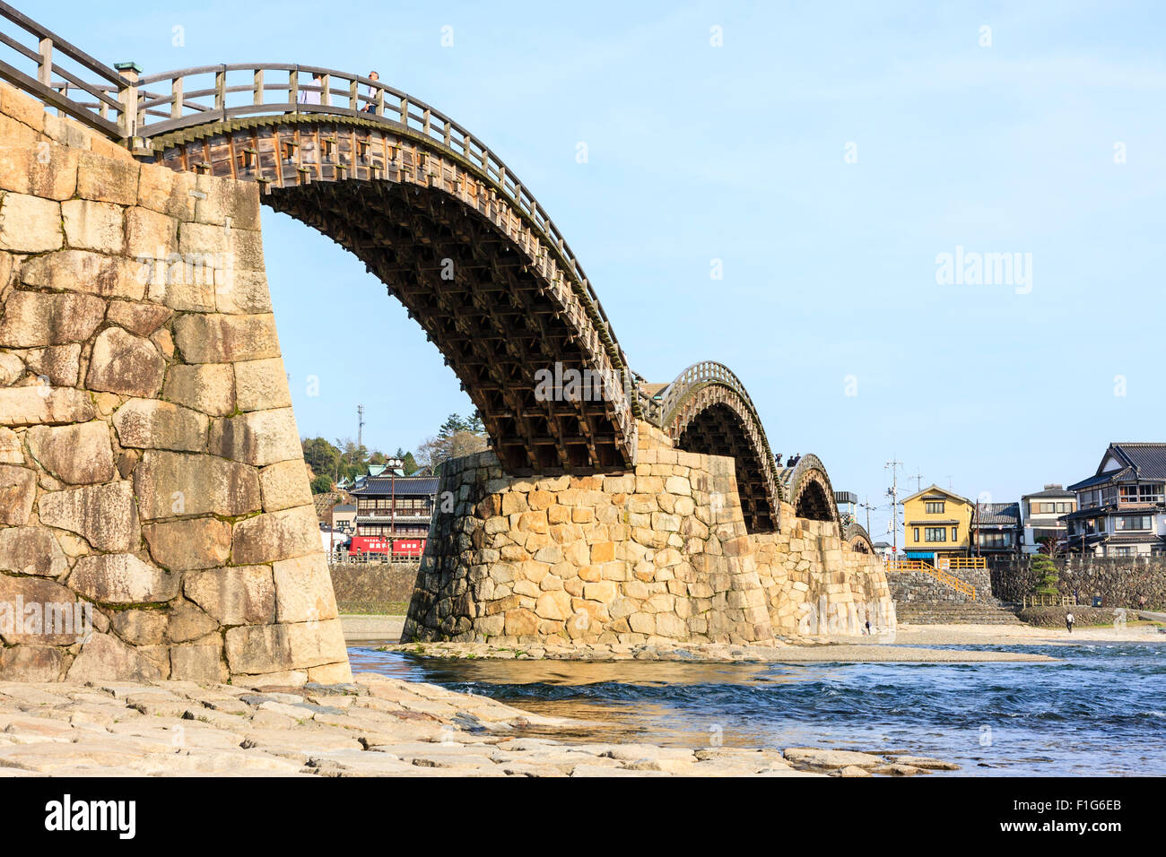 Iwakuni, Japan. The multi-arched wooden Kintaikyo bridge, with people ...